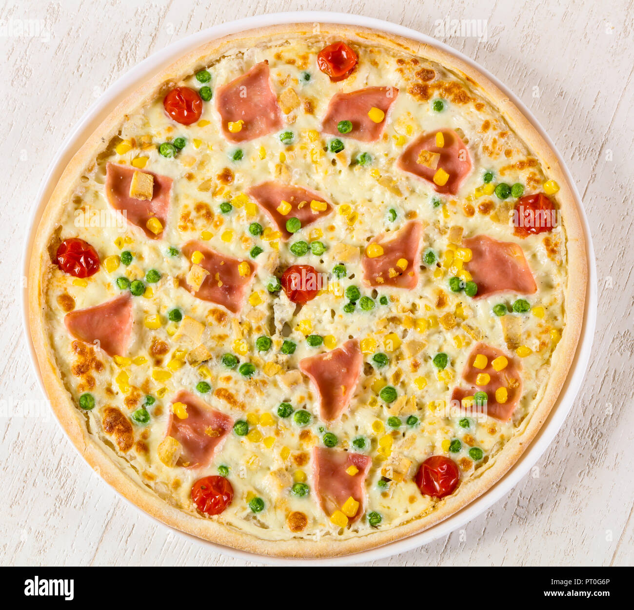 Pizza with ham and cheese Stock Photo - Alamy