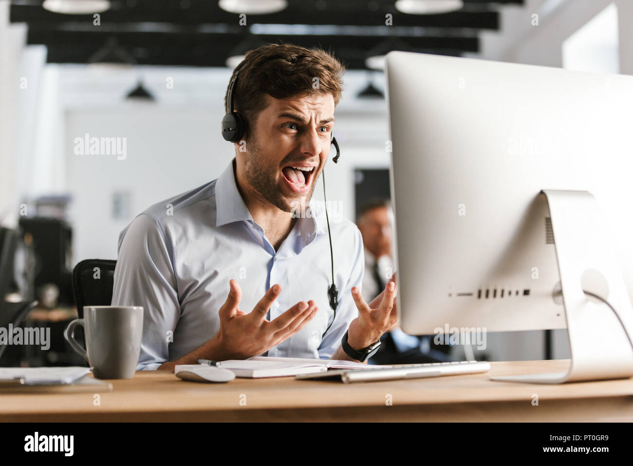 Screaming into microphone hi-res stock photography and images - Alamy