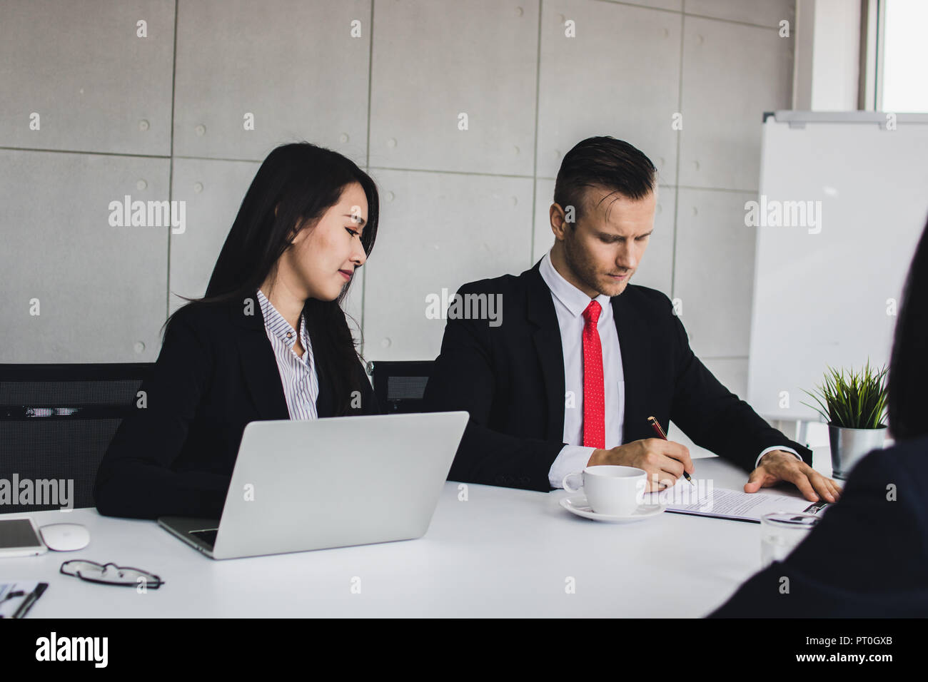Reading before signing hi-res stock photography and images - Alamy