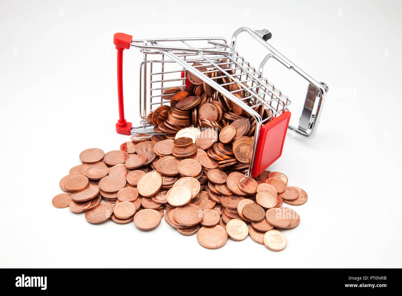 shopping cart with coins on a white background Stock Photo - Alamy