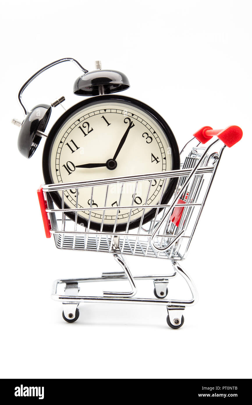 alarm clock in a shopping cart Stock Photo - Alamy
