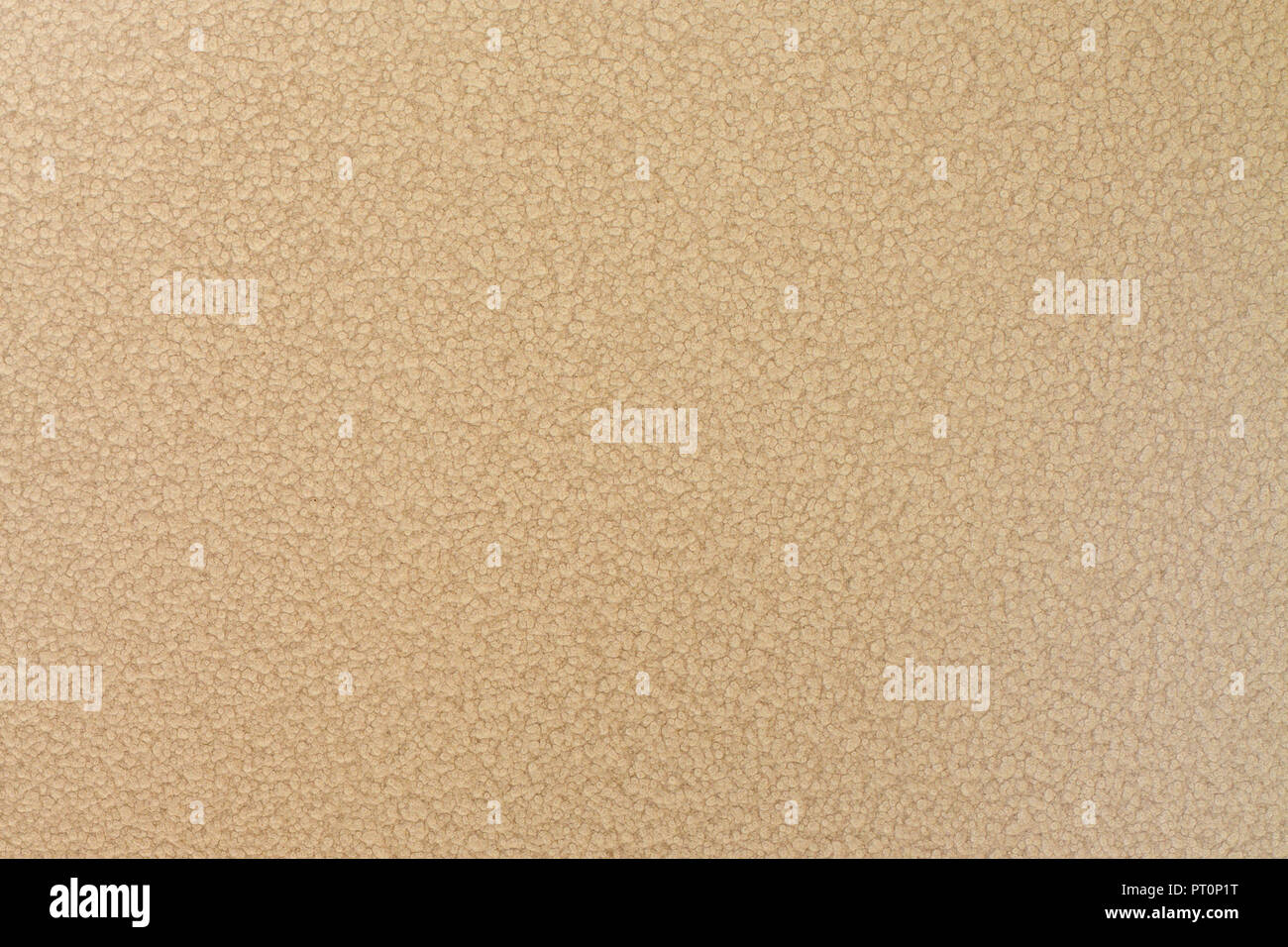 Glowing metal surface in golden color with porous heterogeneous texture ...