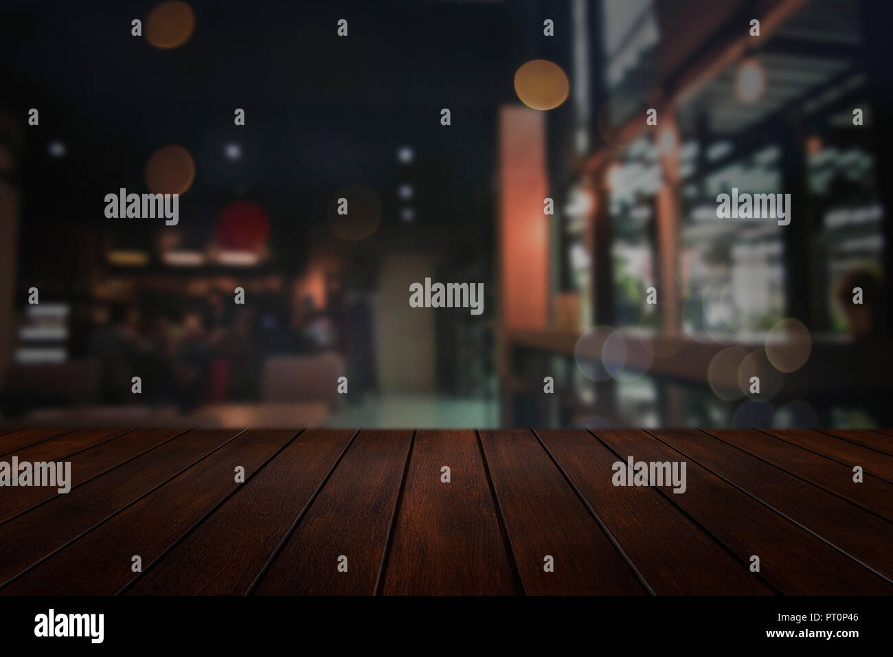 wood table and counter in front of cafe or restaurant background, can ...