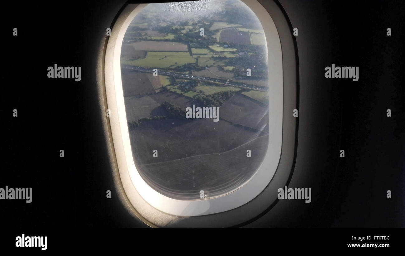 Airplane taking off view throught the window of airplane Stock Photo ...