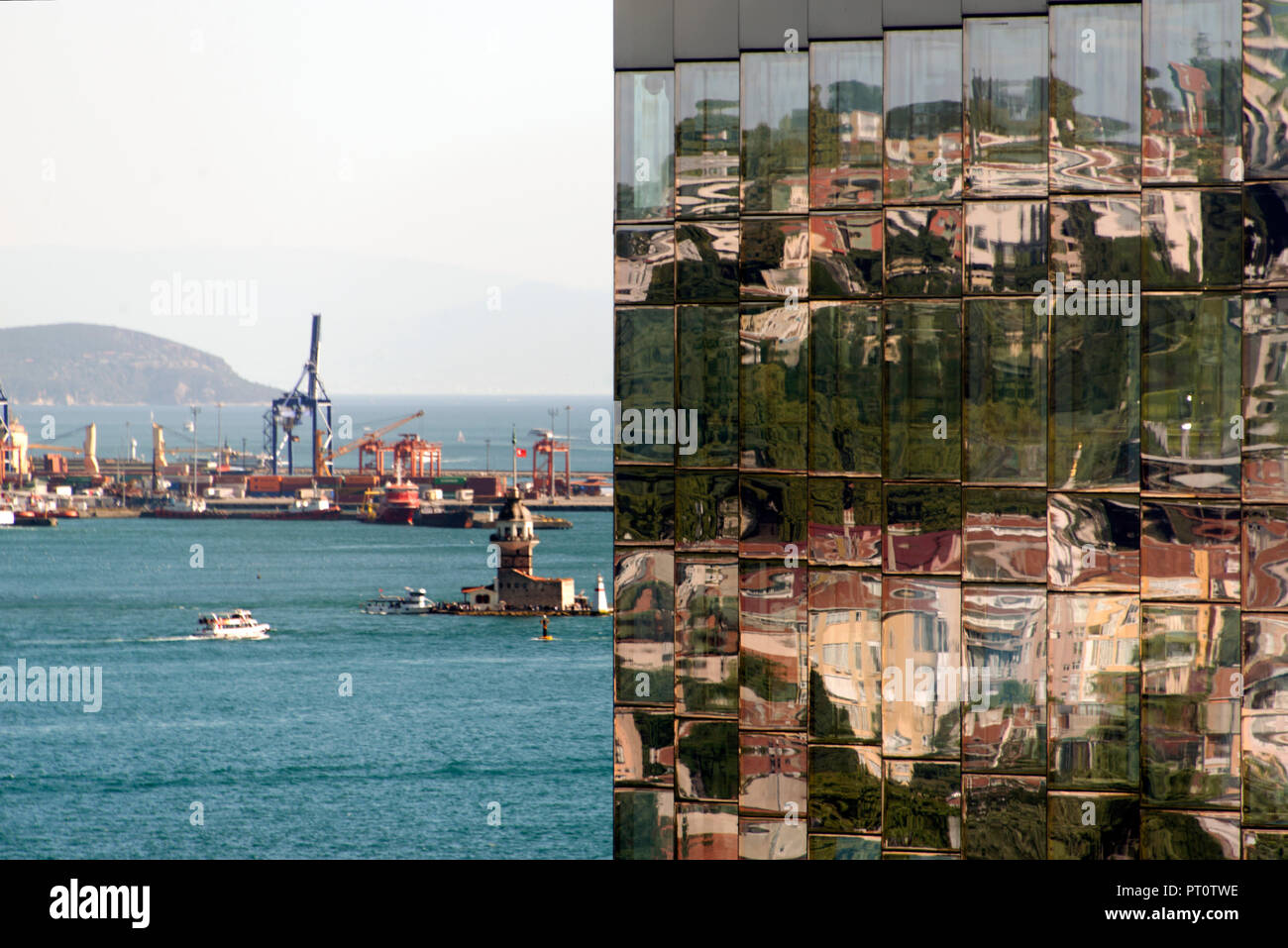 A view of cityscape of Istanbul and a reflection from a glass mirror ...