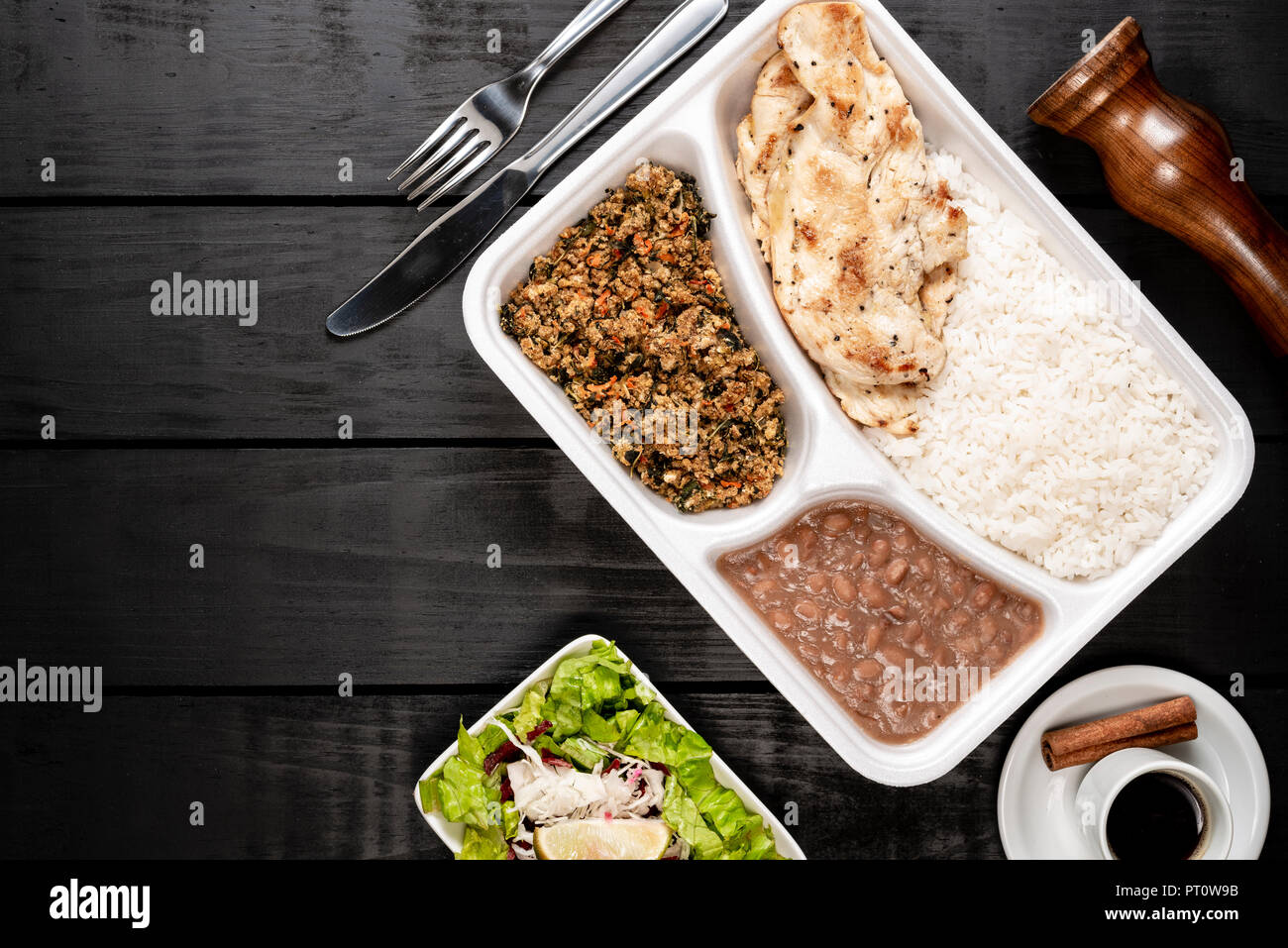 white rice chicken beans and manioc flour. Brazilian lunch box. top ...