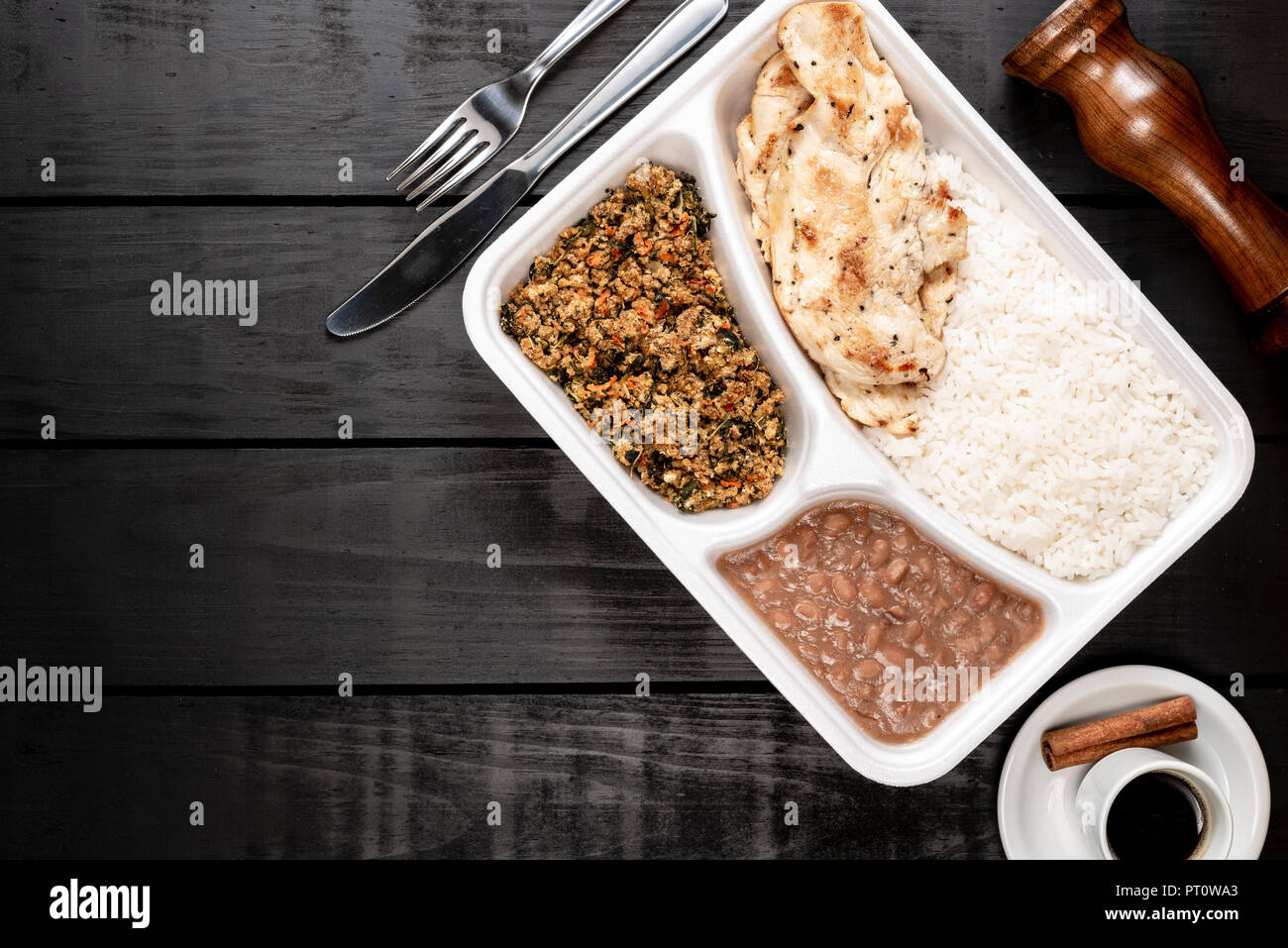 white rice chicken beans and manioc flour. Brazilian lunch box. top ...