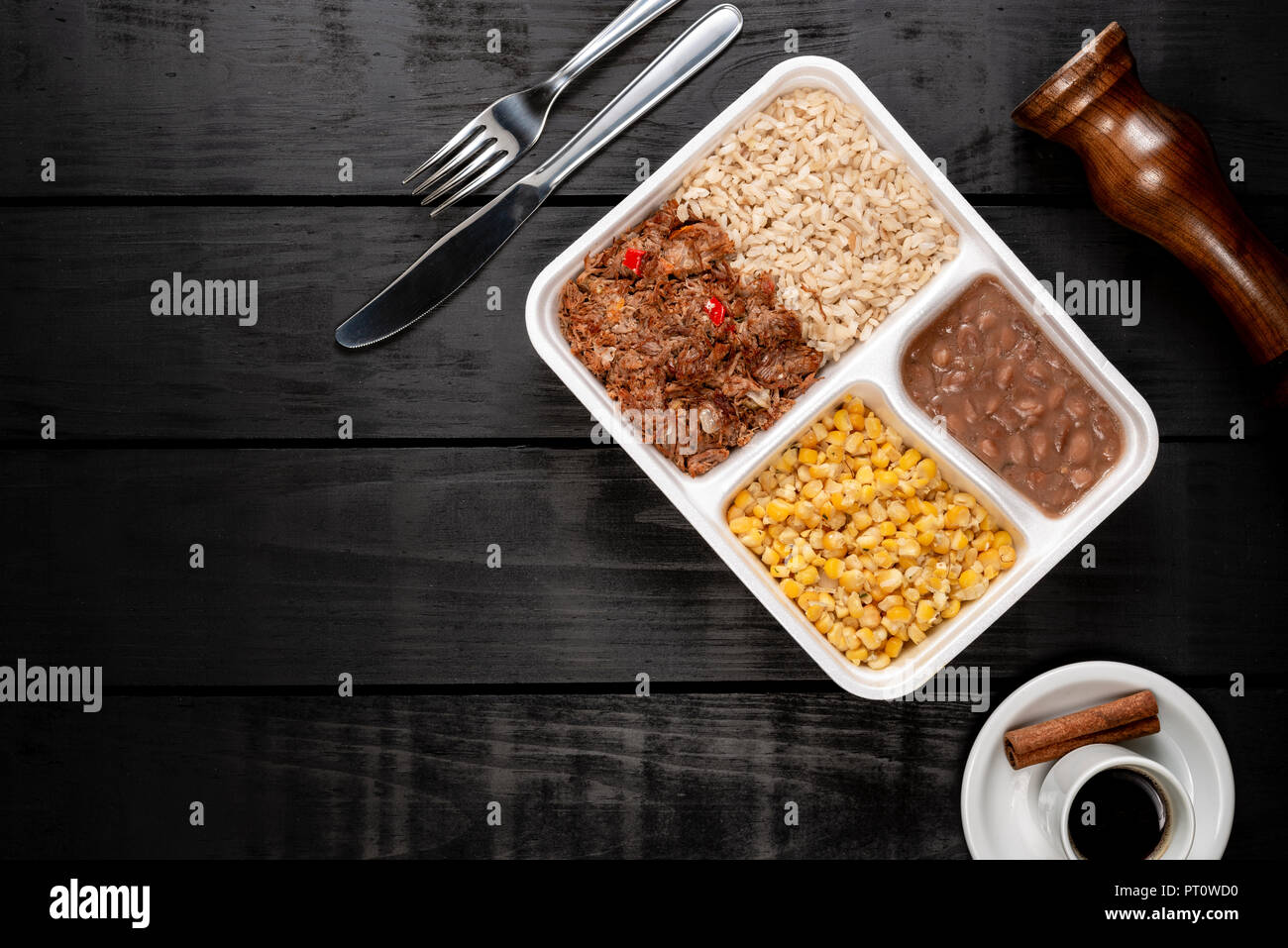 Brown rice with shredded beef and corn stew. Brazilian lunch box. top ...