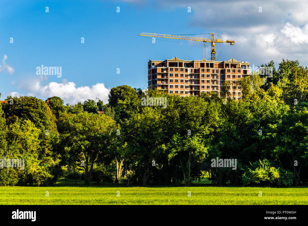 construction of a residential complex in the green zone, background ...