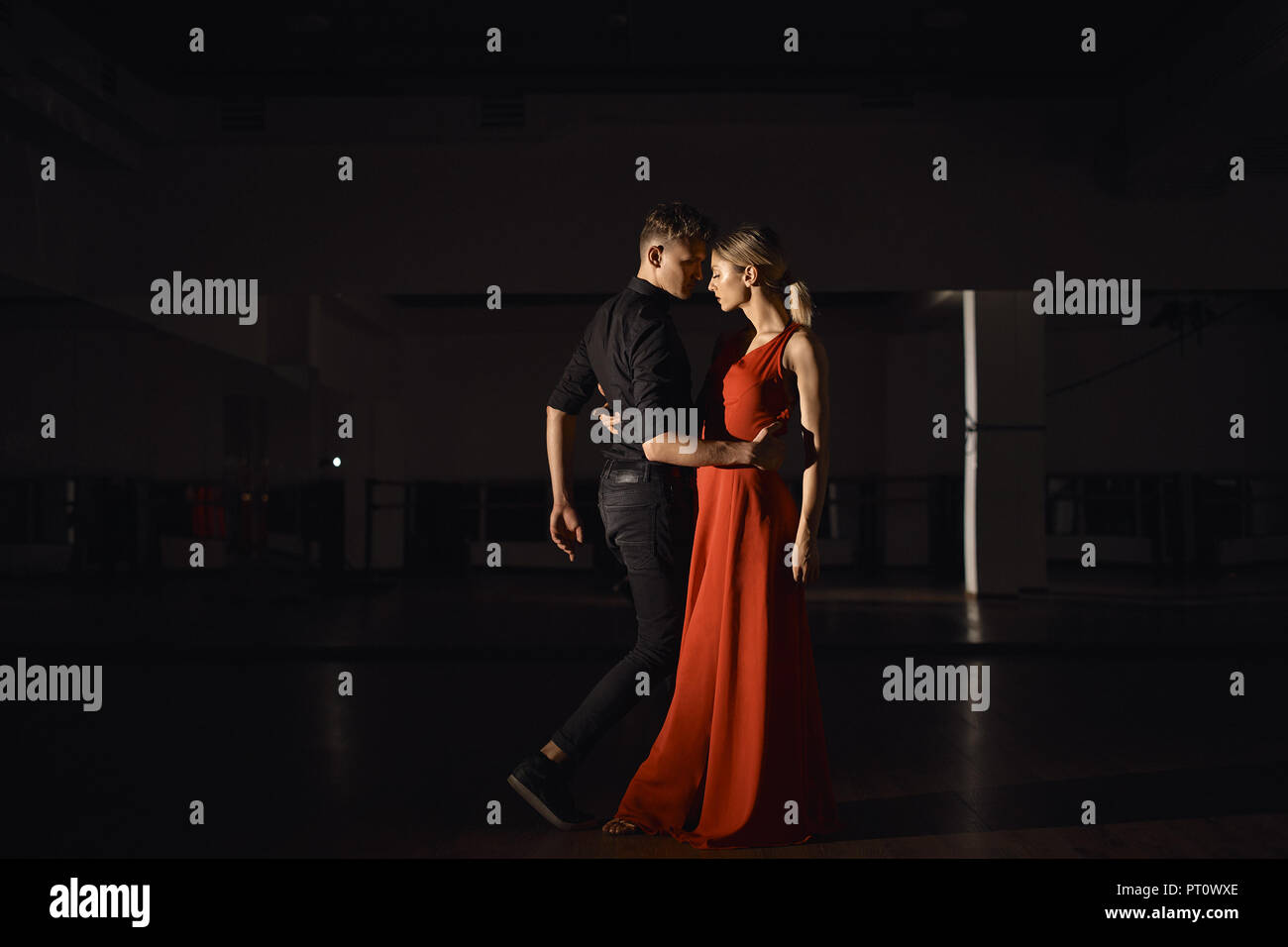 Attractive male and female dancing tango hi-res stock photography and images - Alamy