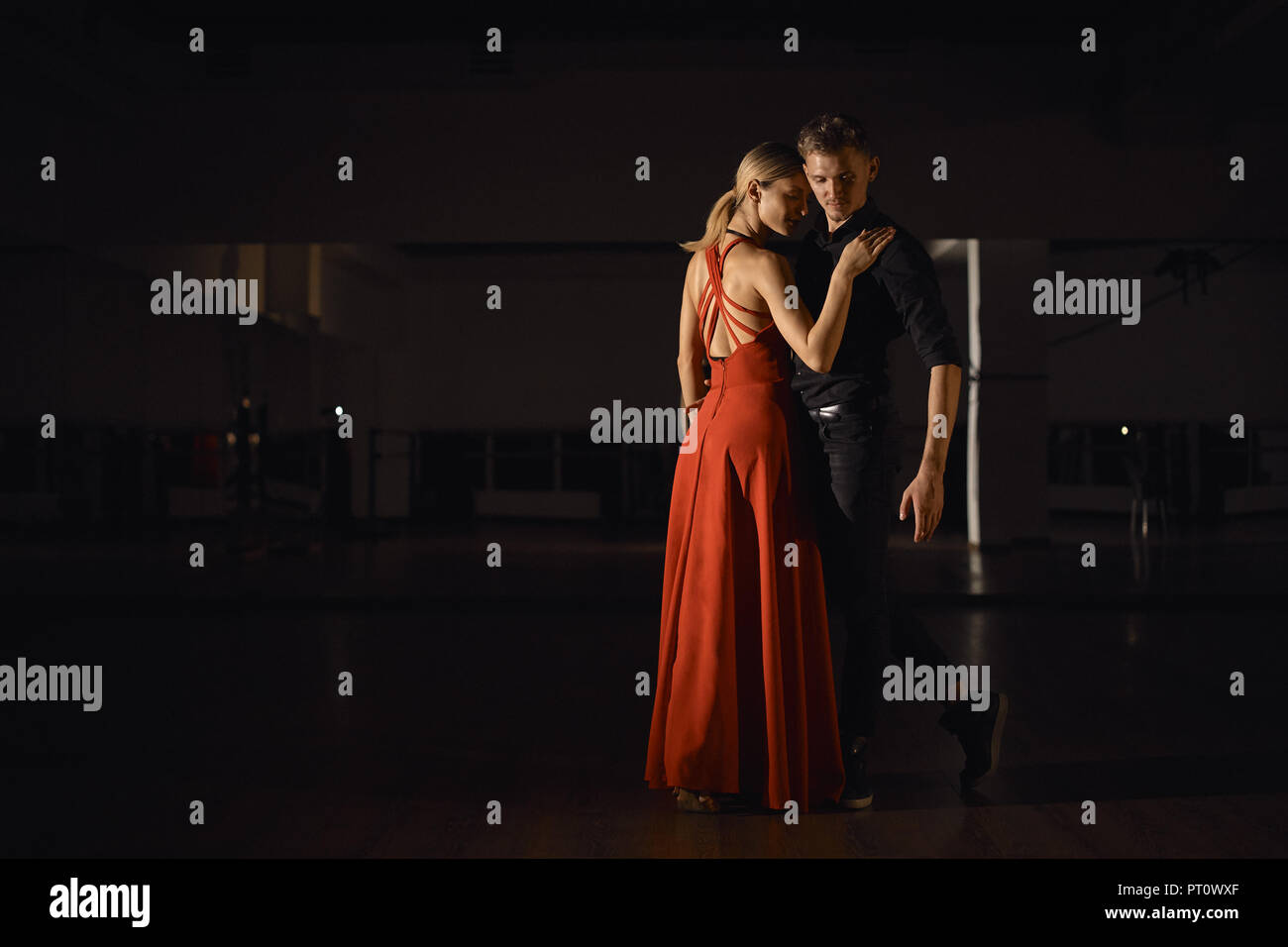 Attractive male and female dancing tango hi-res stock photography and images - Alamy