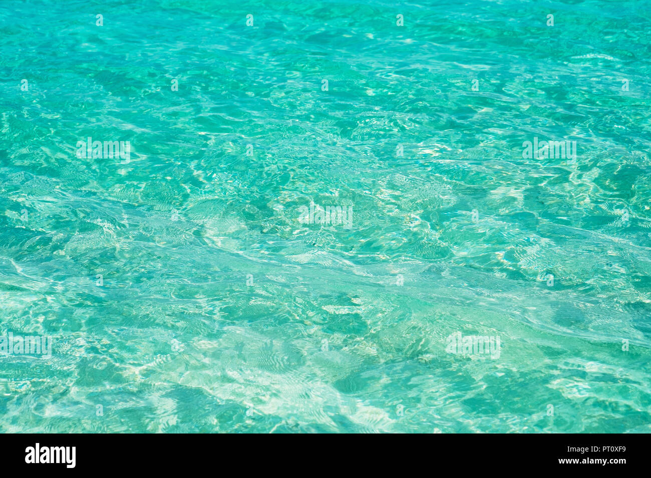 Turquoise ocean surface texture Stock Photo - Alamy