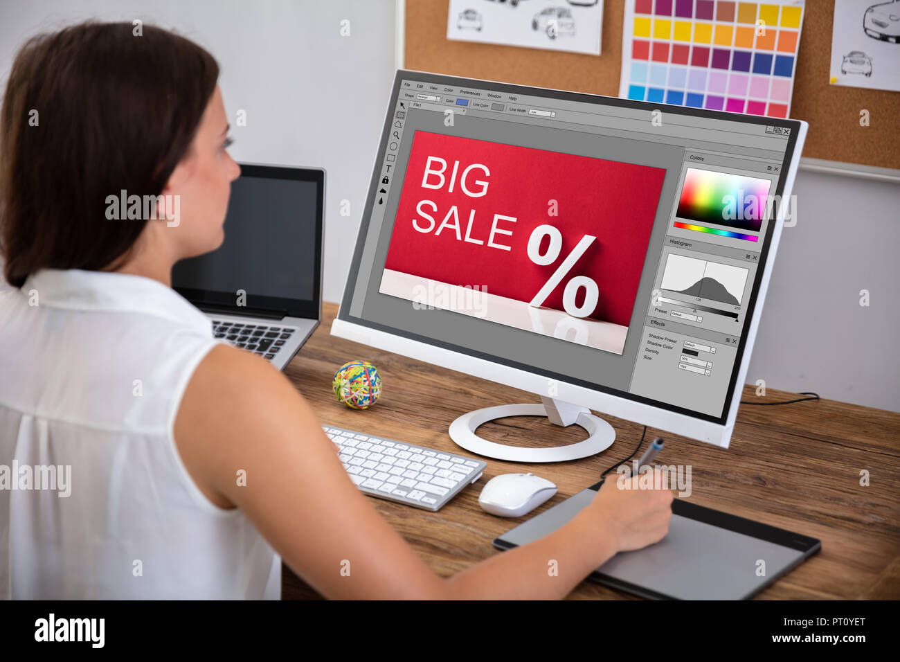 Female Designer Using Graphic Tablet While Working On Computer Stock ...