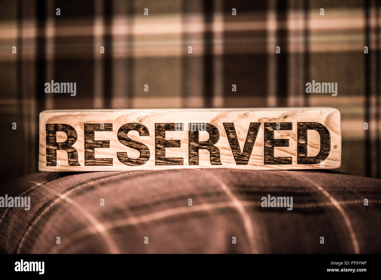 wooden sign saying reserved,close-up ,background ,concept hotels and ...