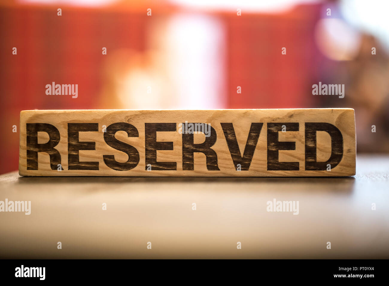 wooden sign saying reserved,close-up ,background ,concept hotels and ...