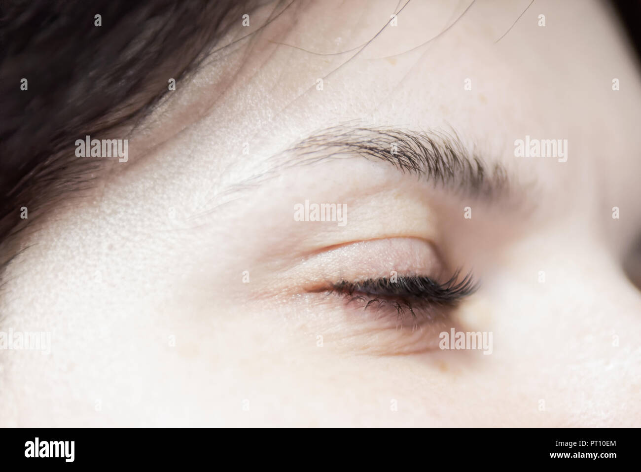 Closeup woman eyes closed hi-res stock photography and images - Alamy