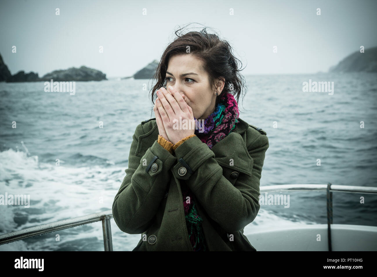 Warming in cold hi-res stock photography and images - Alamy