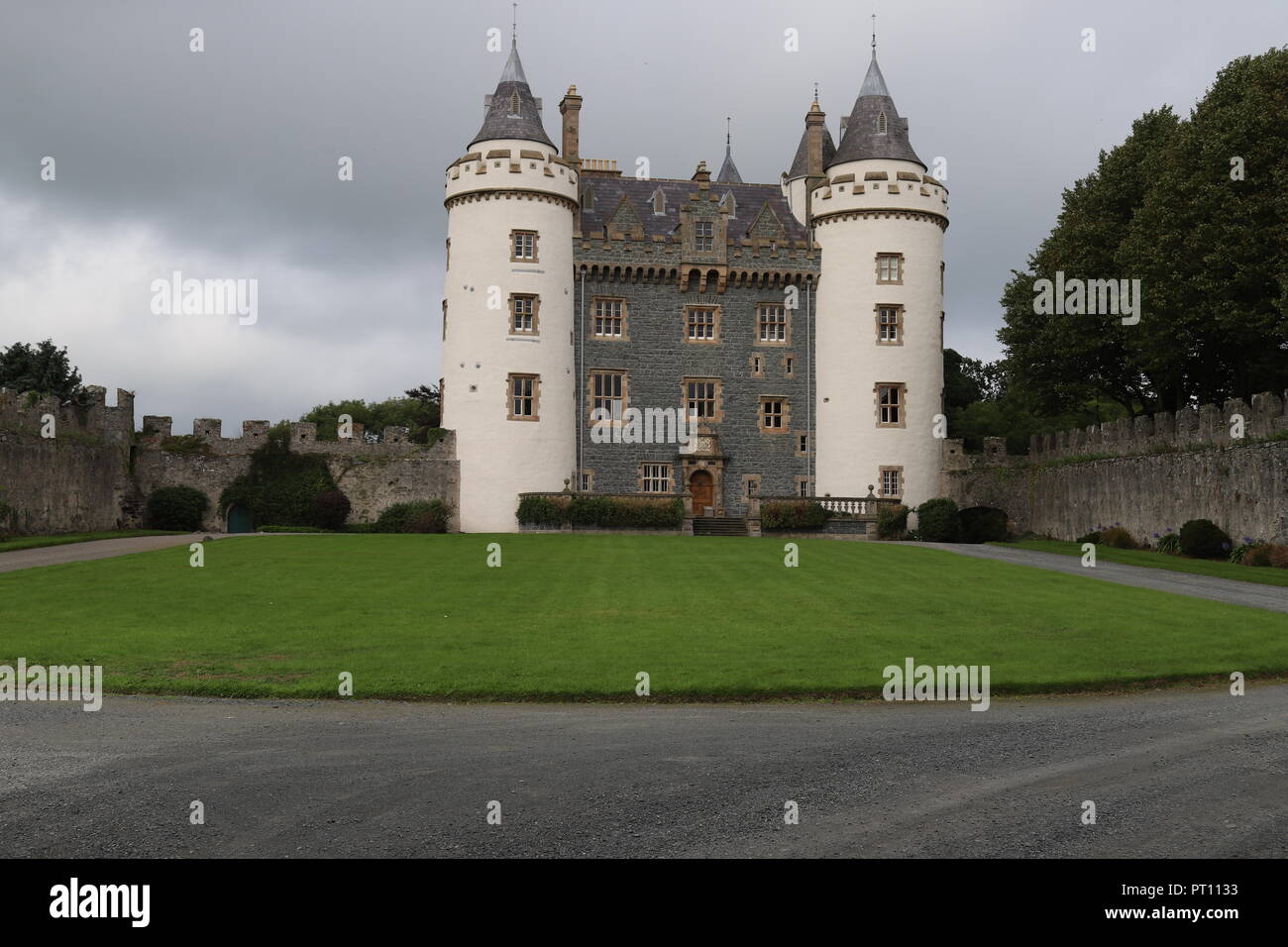 View of the facade of Killyeagh Castle from its gated courtyard ...