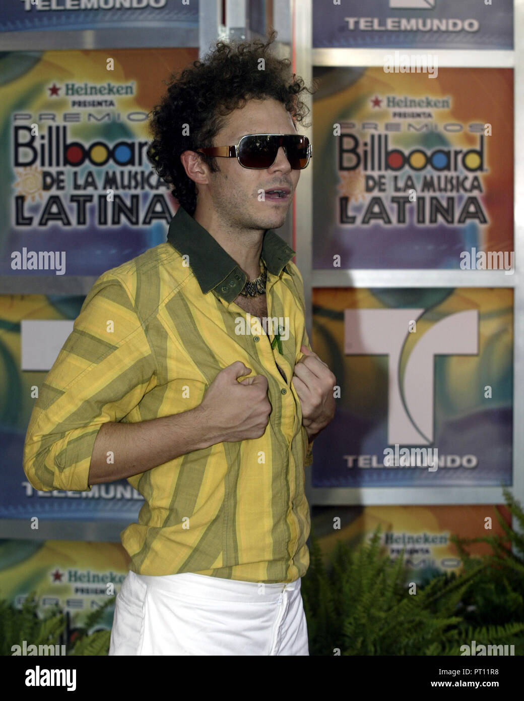 Cabas arrives on the red carpet entering the 2005 Latin Billboard ...