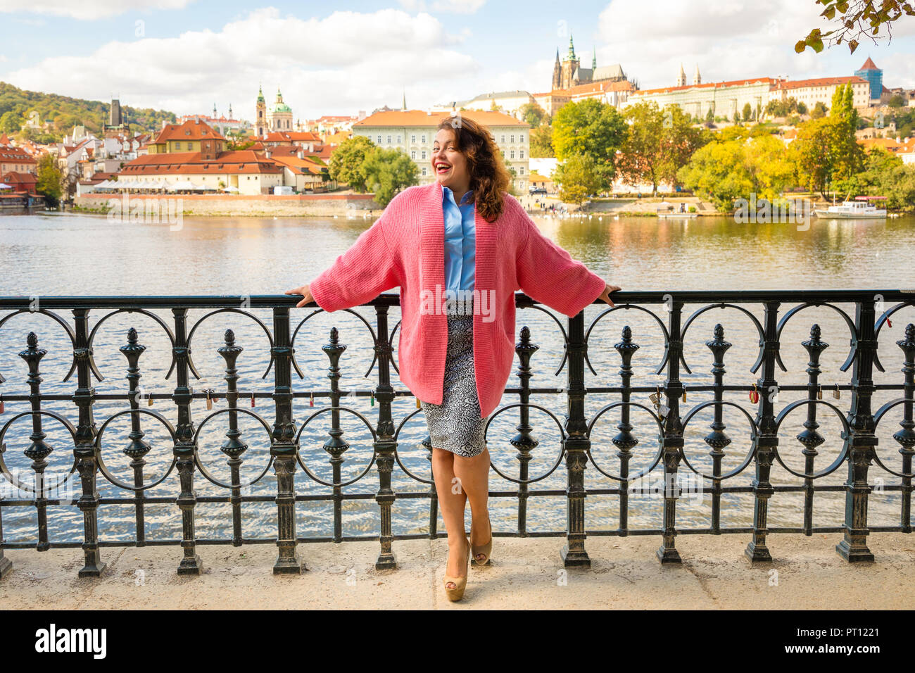 Portrait of young woman Old Town of Prague and river Vltava background ...