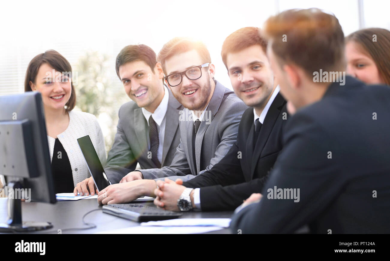 Manager starts a meeting with business team Stock Photo - Alamy