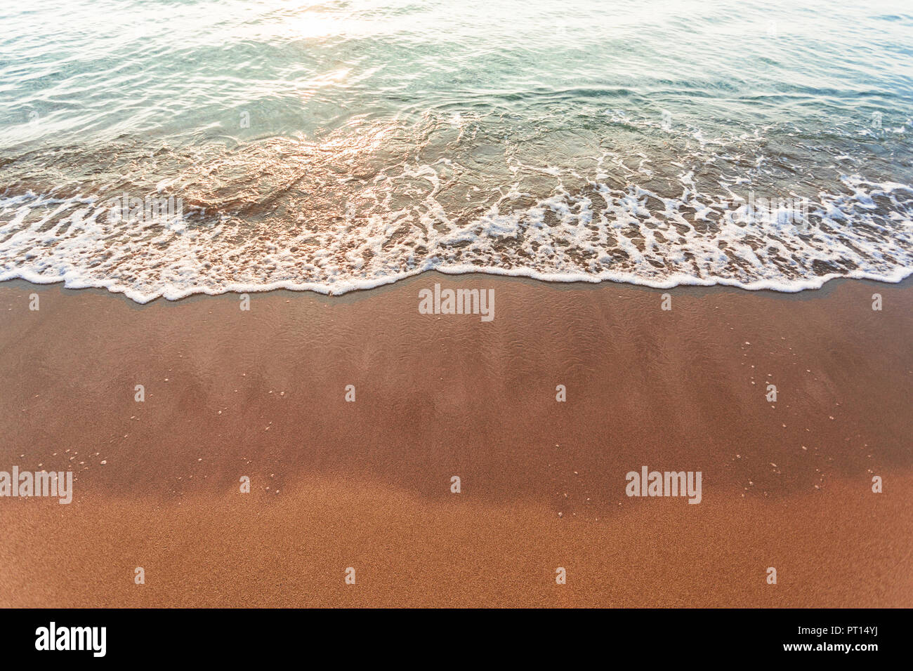 Blue waves in the sand Stock Photo - Alamy
