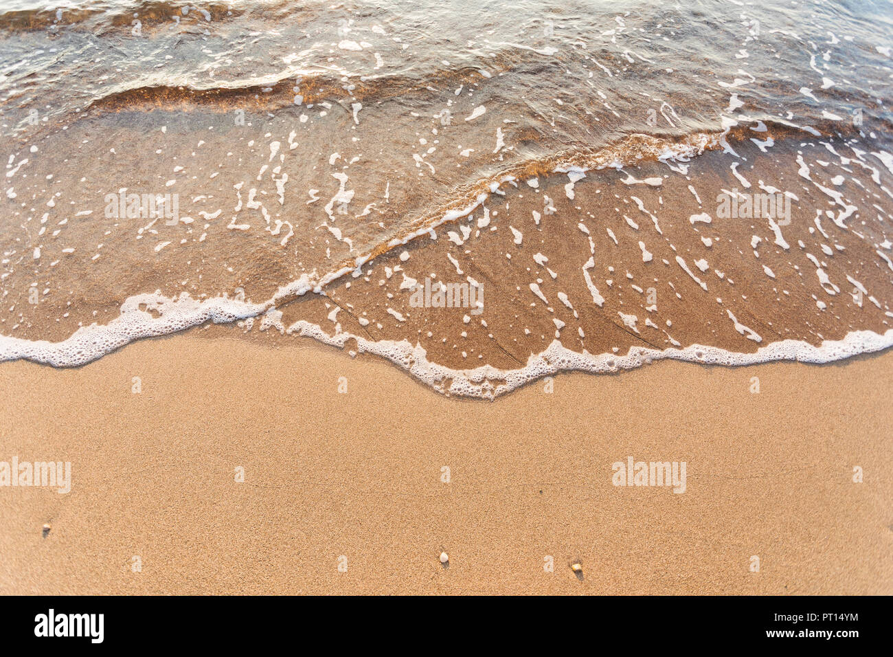 Blue waves in the sand Stock Photo - Alamy