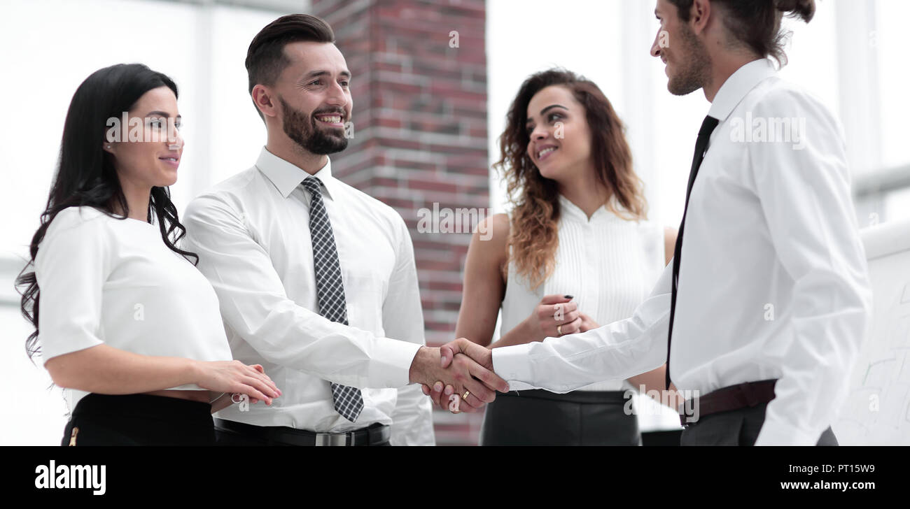 welcome and handshake business partners.the concept of partnership ...