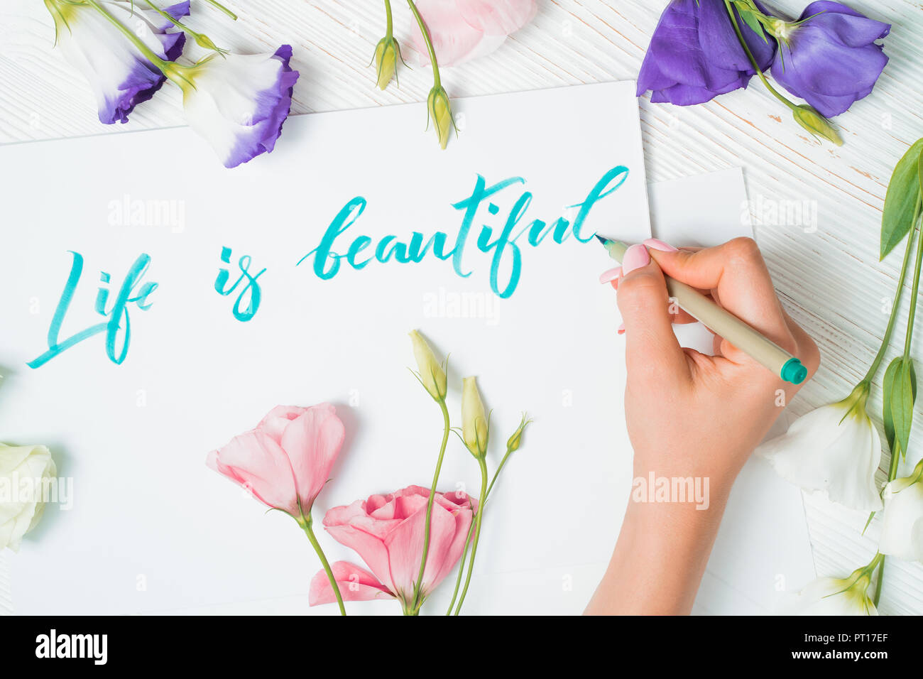 Life is beautiful text. Font of lettering word on white paper with ...