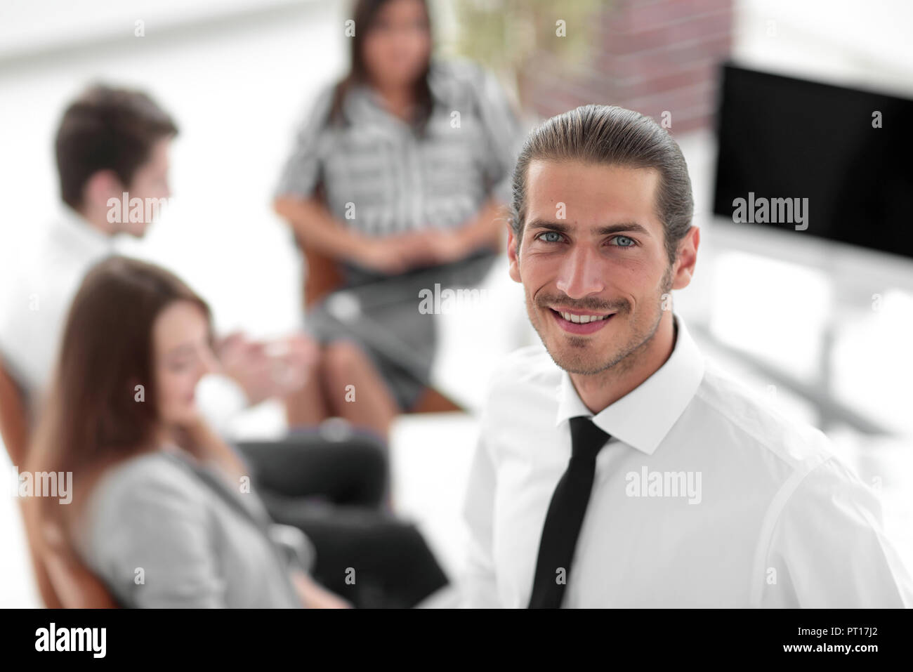 successful young business men on blurred background.photo with copy ...