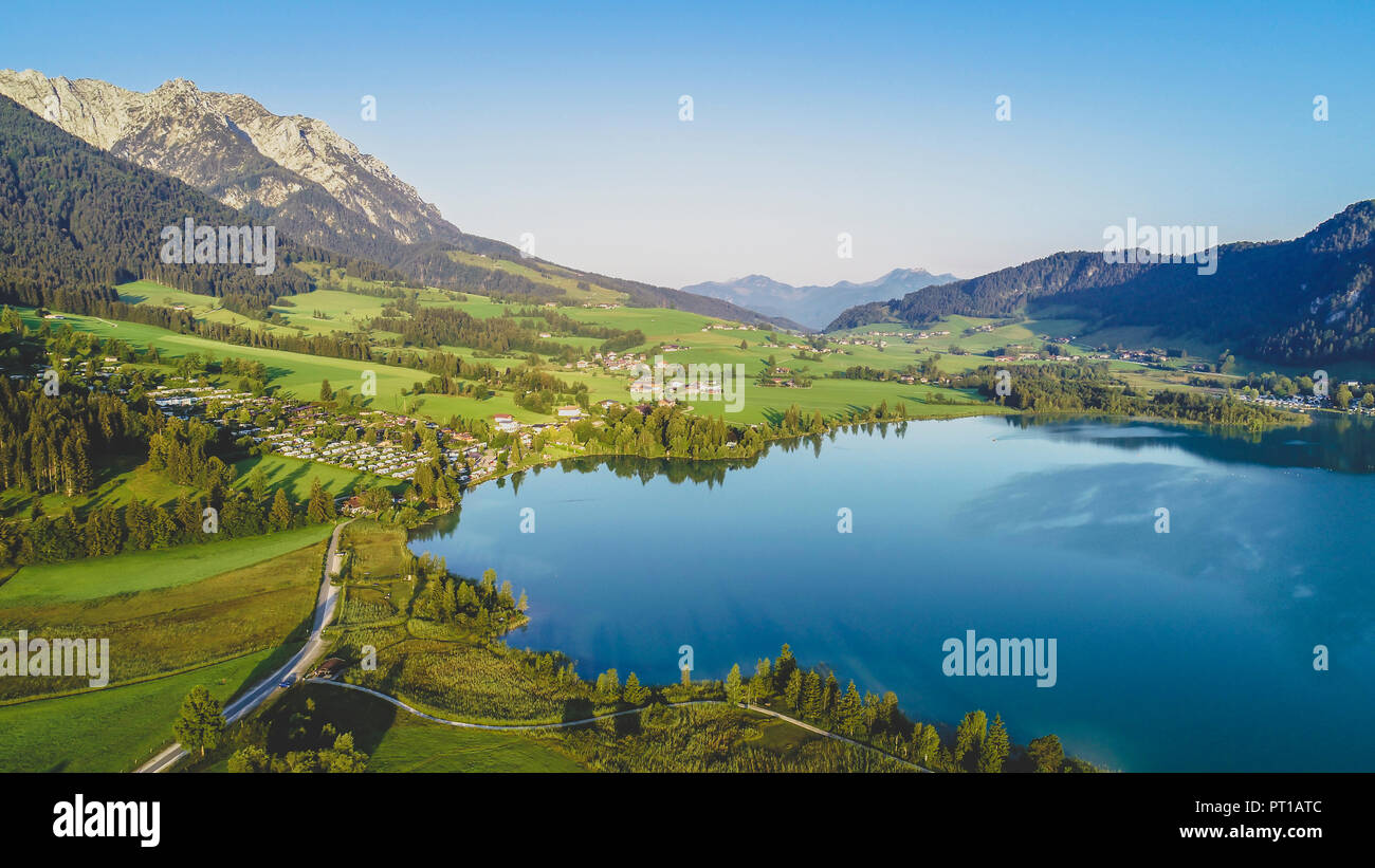 Austria, Tyrol, Kaiserwinkl, Aerial view of lake Walchsee Stock Photo ...