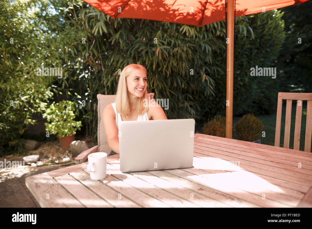 Work garden laptop hi-res stock photography and images - Alamy