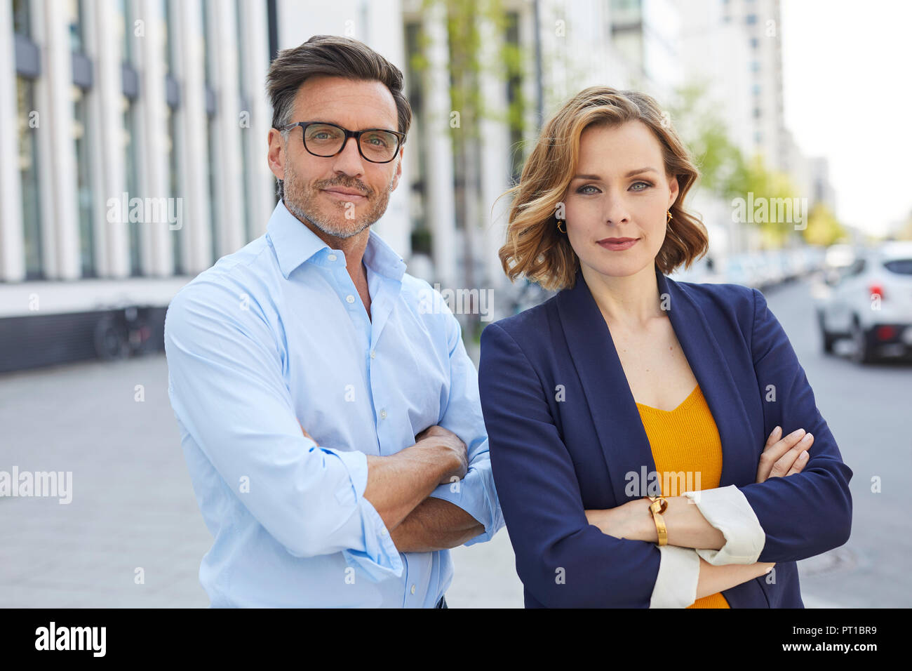 Portrait of two business people Stock Photo - Alamy