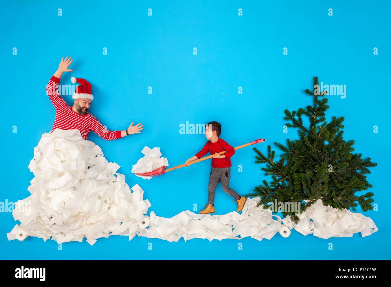 Father and son shoveling snow Stock Photo - Alamy
