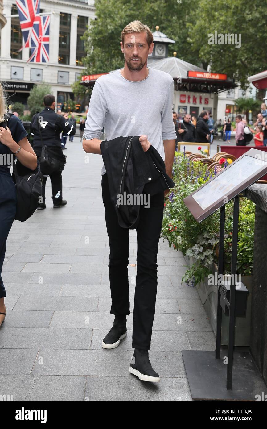 Peter Crouch seen leaving Global studios after covering Radio X for ...
