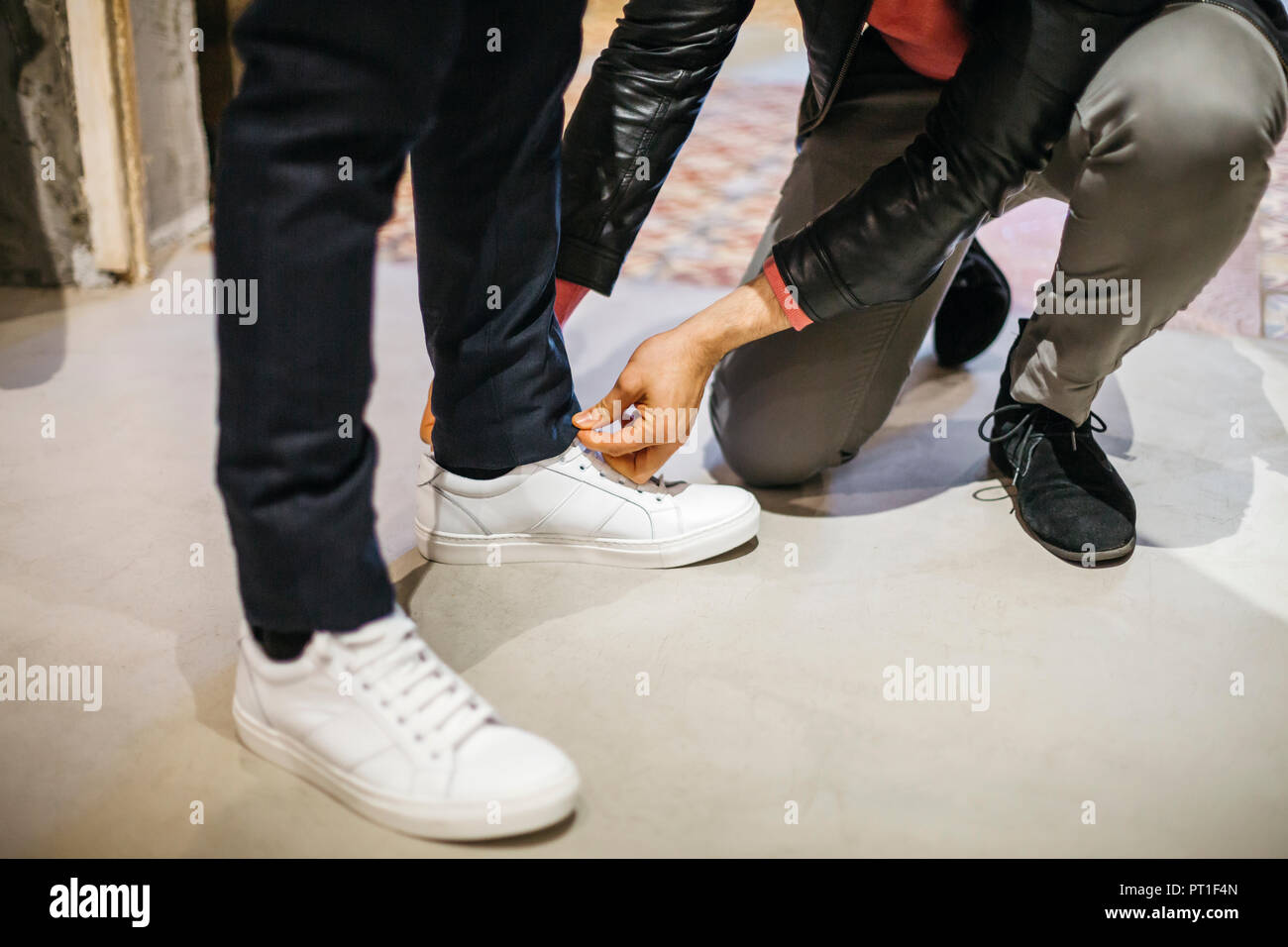 Assistant shop shoes hi-res stock photography and images - Alamy