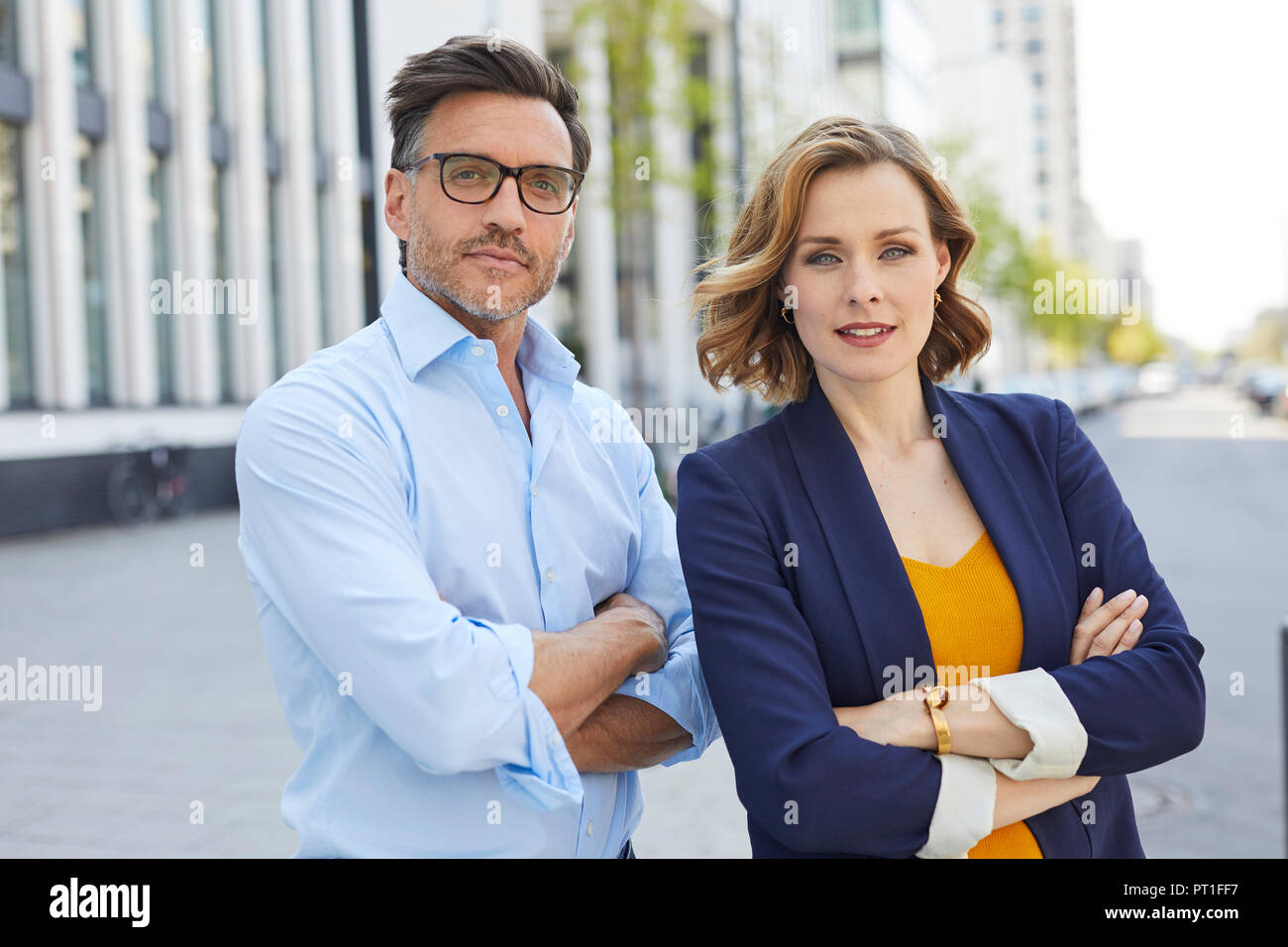 Portrait of two business people Stock Photo - Alamy