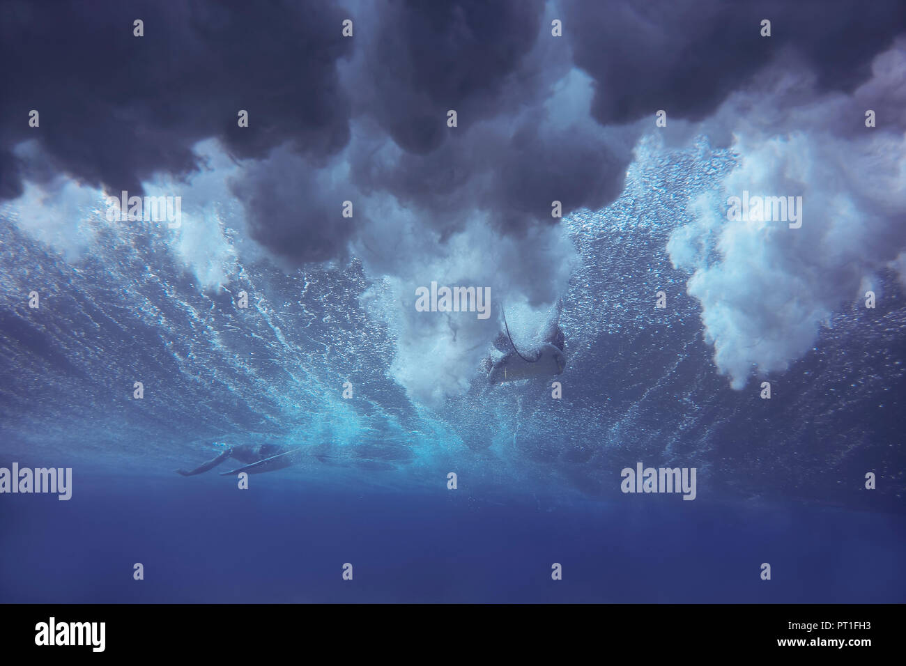 Underwater view from below surfer hi-res stock photography and images ...