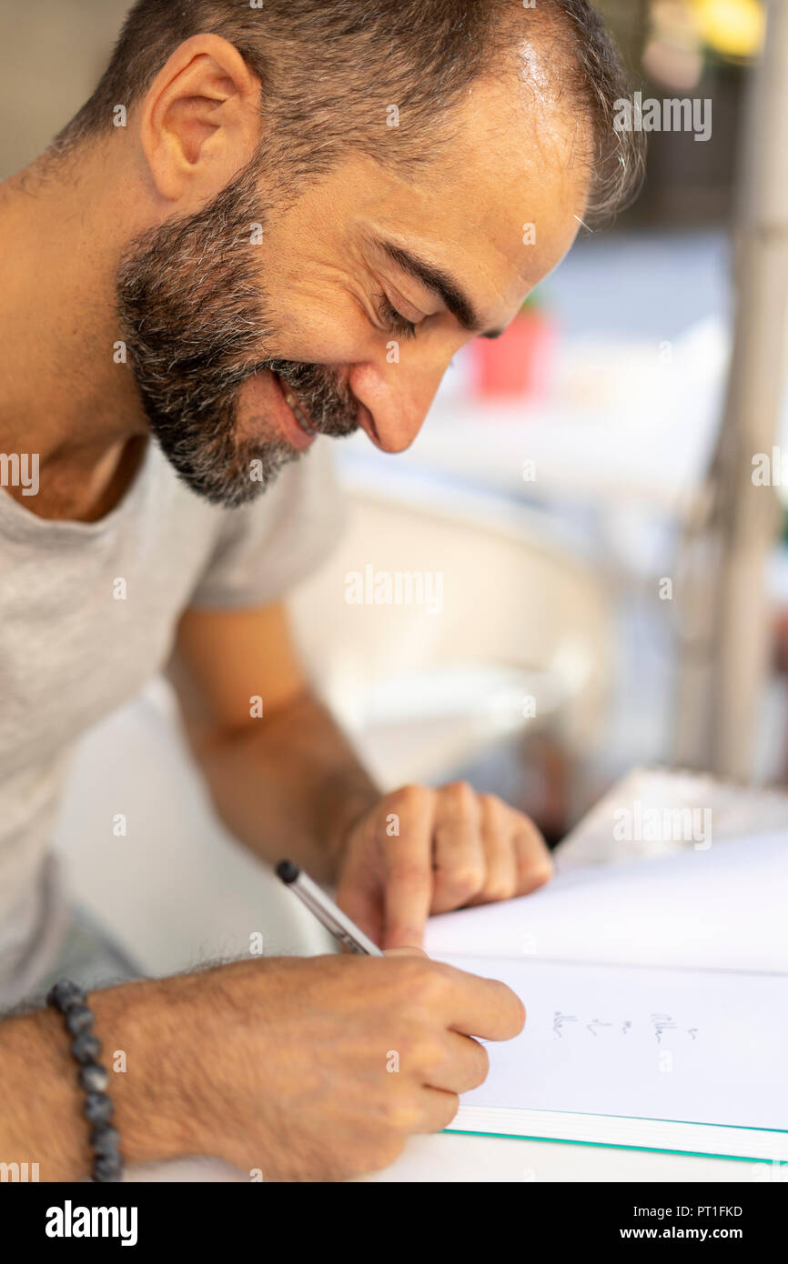 Signing a book hi-res stock photography and images - Alamy