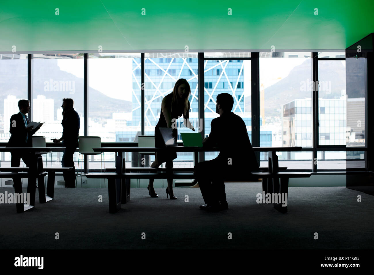 Colleagues working together in open hi-res stock photography and images ...