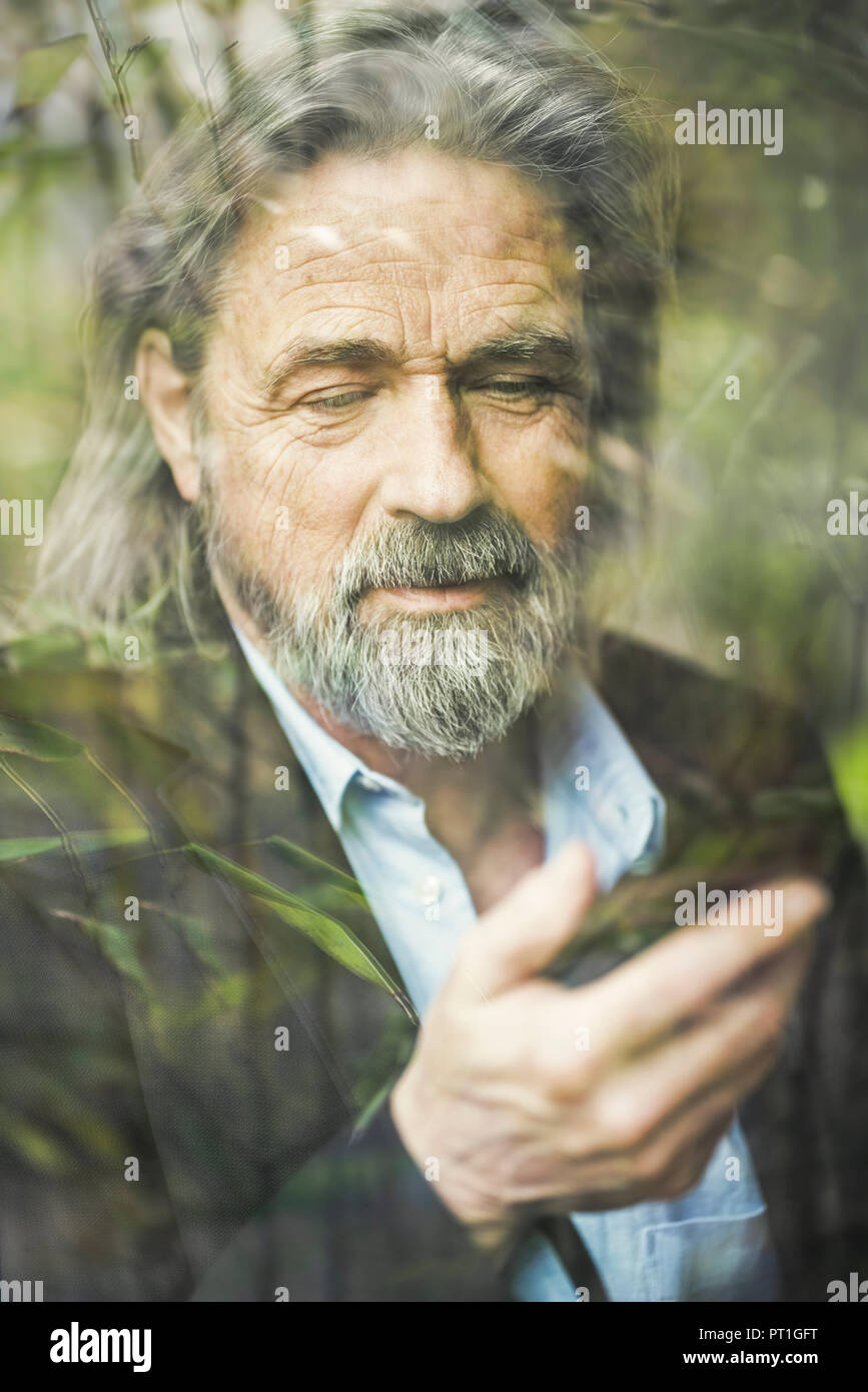 Standing at window of hi-res stock photography and images - Alamy