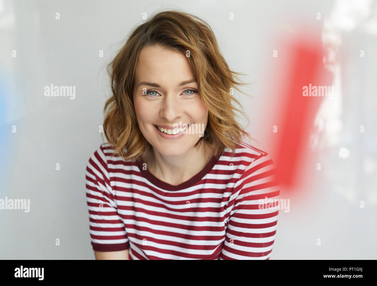 Woman red shirt hi-res stock photography and images - Alamy