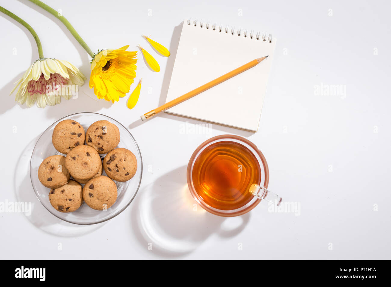 workspace with notebook keyboard, sketchbook, diary, coffee on white ...