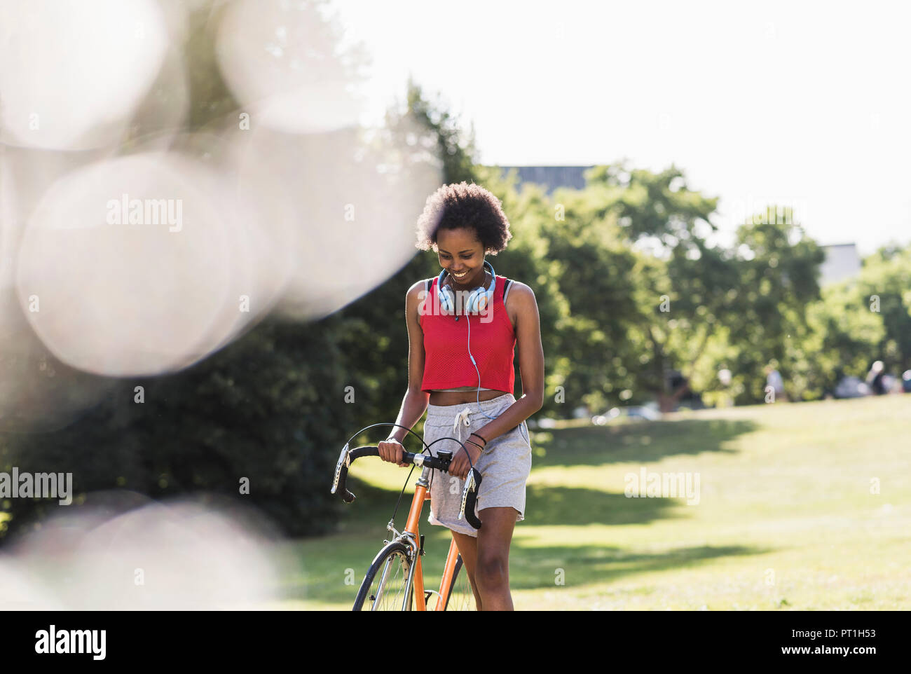 Athlete pushing bicycle hi-res stock photography and images - Alamy