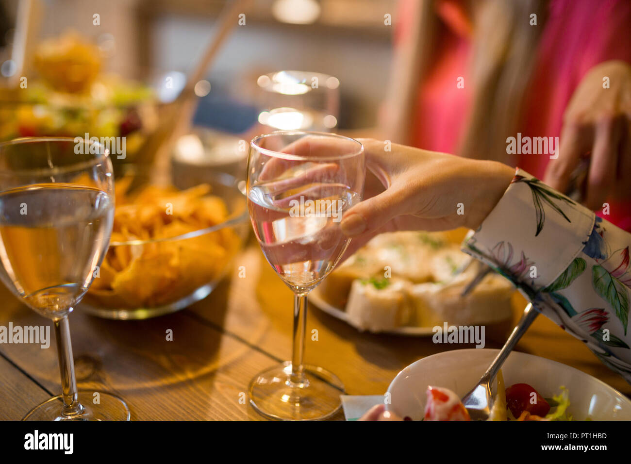 Two friends having dinner together hi-res stock photography and images ...