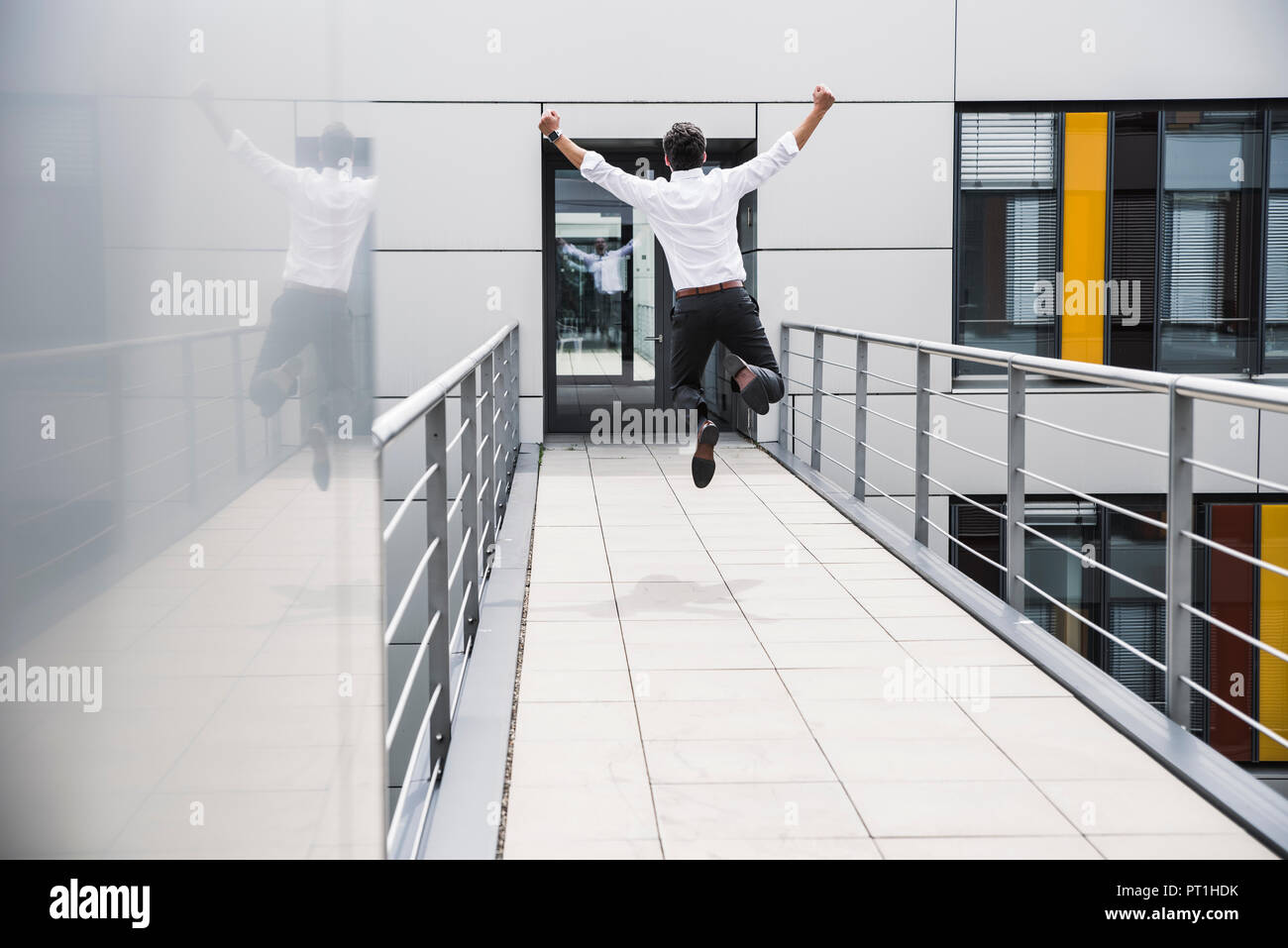 Jumping from building hi-res stock photography and images - Alamy