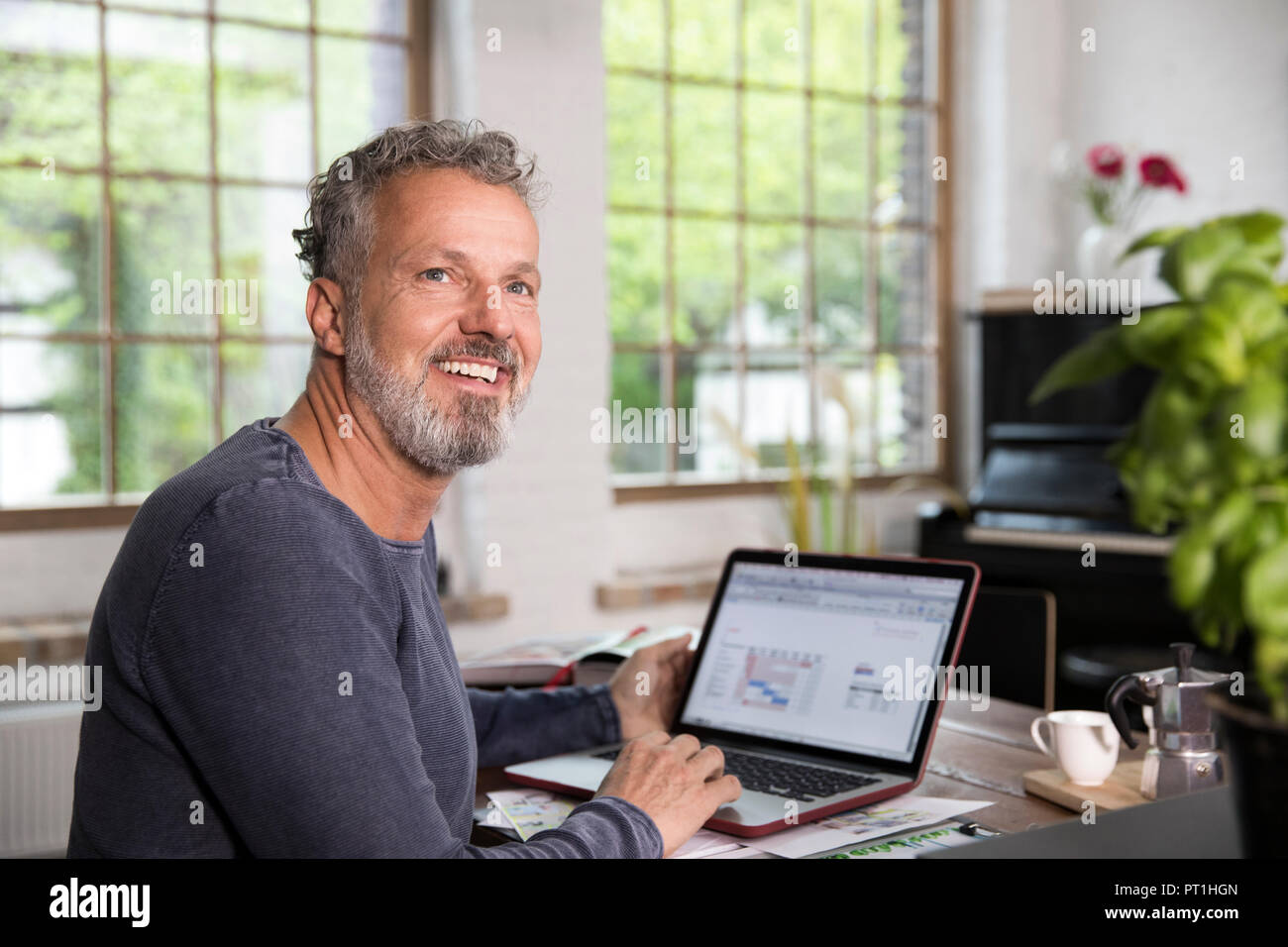 Man working home office with computer hi-res stock photography and ...
