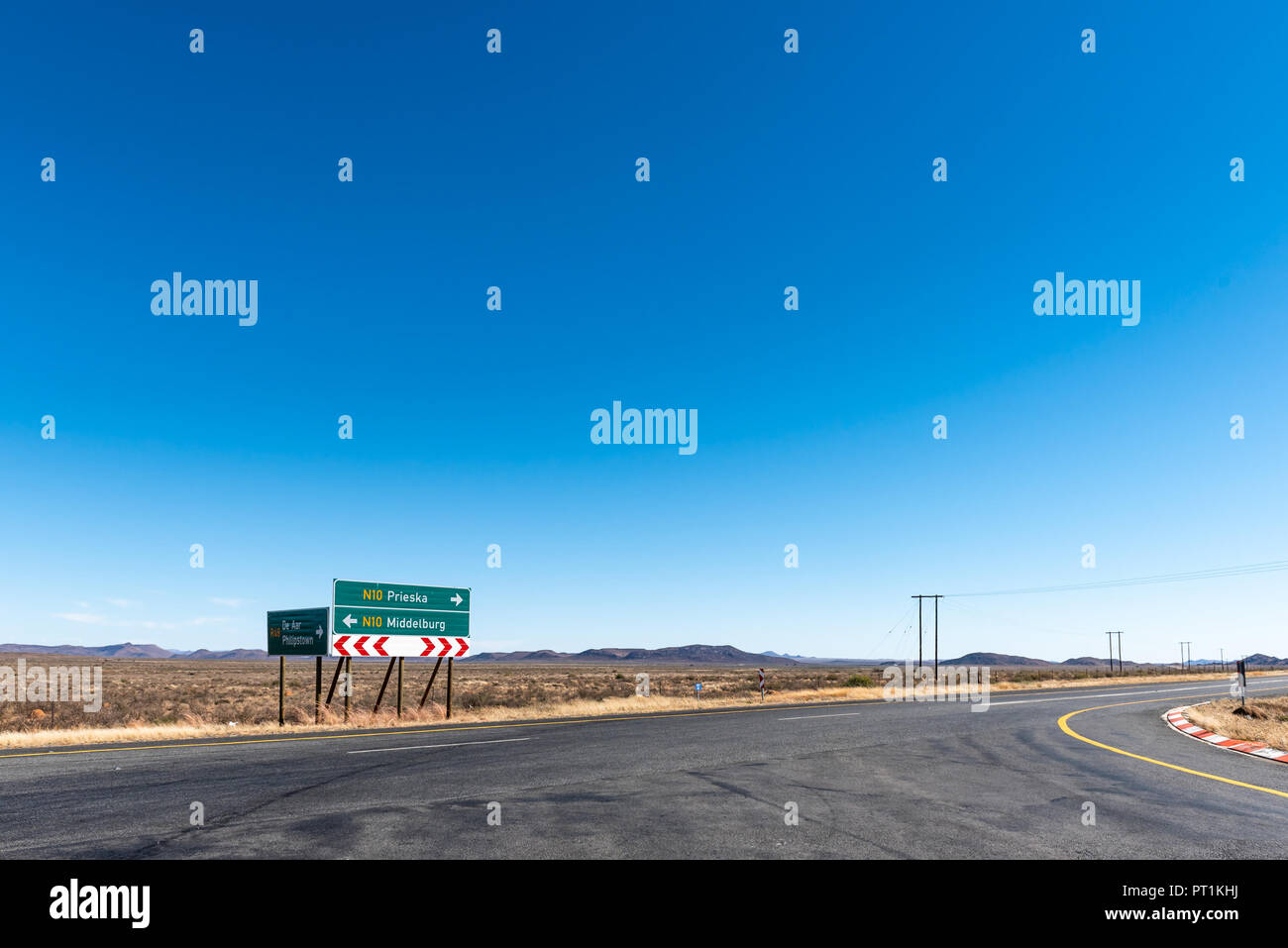 Directional signs at the conjunction of the N10 and R48 roads at De Aar ...