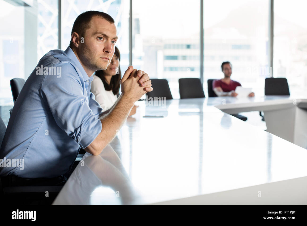 Business people sitting in conference room Stock Photo - Alamy