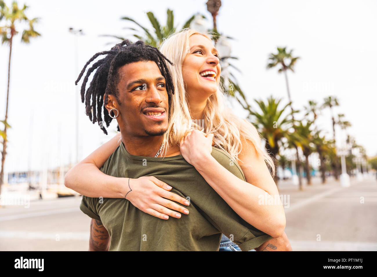 Portrait multicultural young couple promenade hi-res stock photography ...